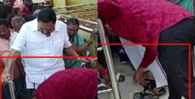 "திமுக அமைச்சரின்" காலணியை "திமுக தொண்டர்" கைகளால் கழற்றியதால் சர்ச்சை..!! - Seithipunal